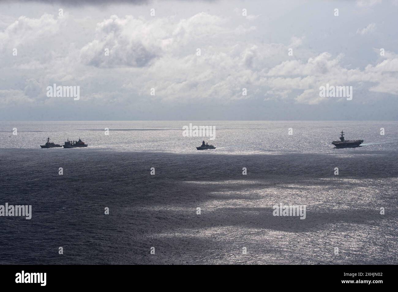 INDIAN OCEAN (July 12, 2024) From left to right: The Arleigh Burke ...