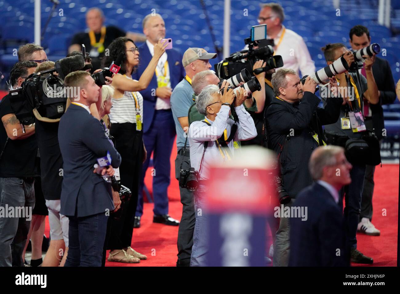 Photographers take photos of South Dakota Gov. Kristi Noem as she ...