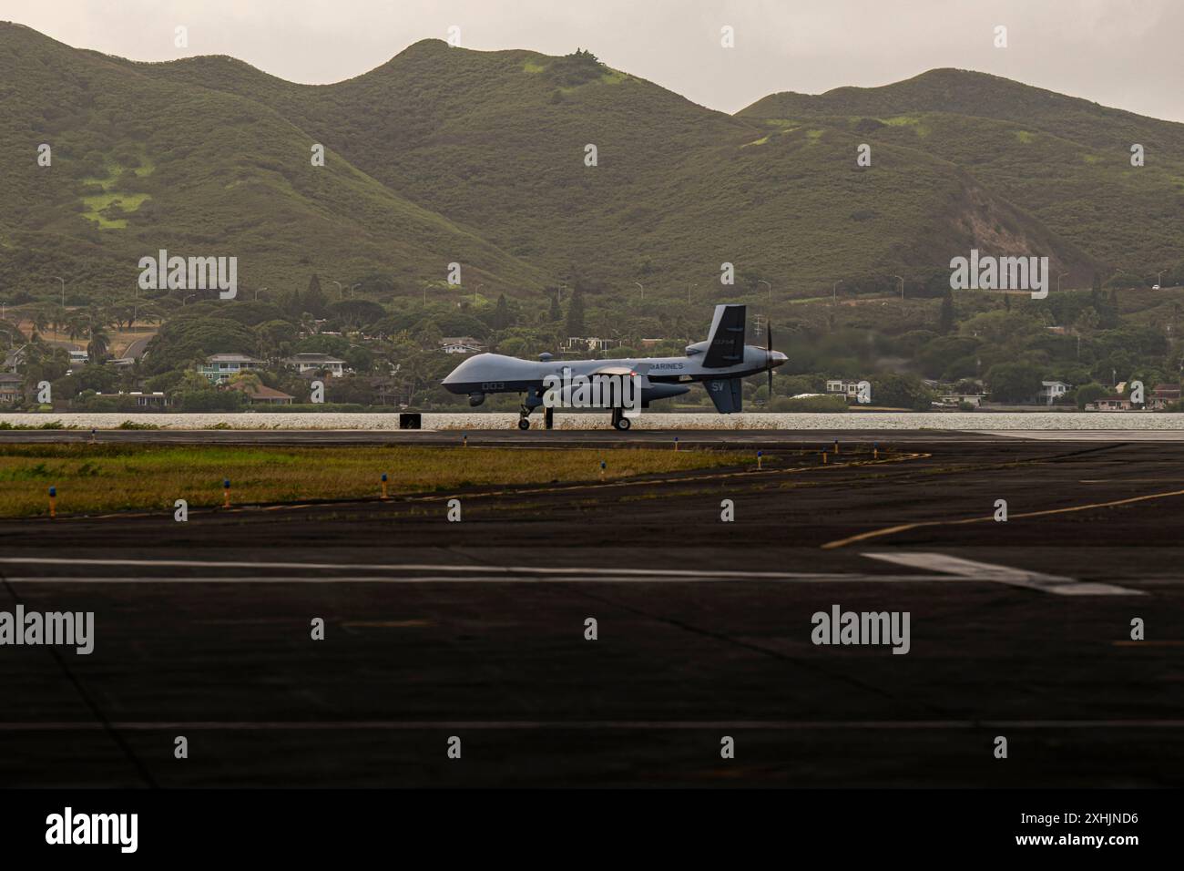 A U.S. MQ-9A MUX/MALE with Marine Unmanned Aerial Vehicle Squadron 3 ...