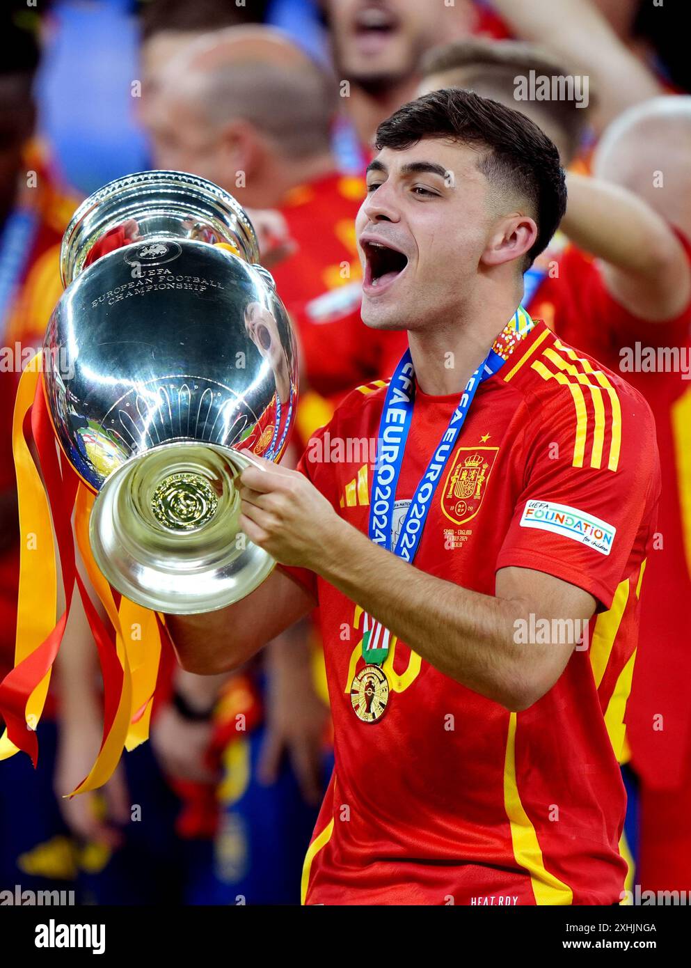 Spain’s Pedri celebrates with the trophy after the UEFA Euro 2024 final ...