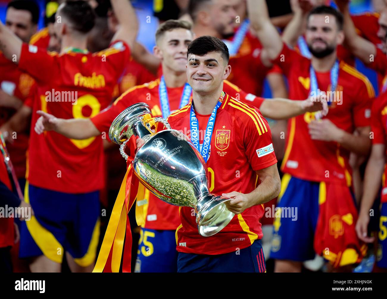 Spain’s Pedri celebrates with the trophy after the UEFA Euro 2024 final ...