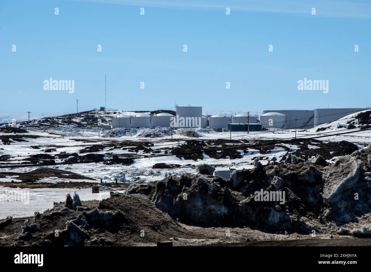 View of fuel storage tanks on Frobisher Bay in Iqaluit, Nunavut, Canada ...