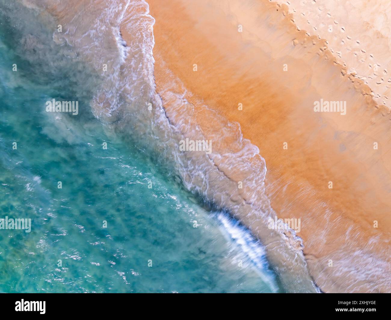 Aerial top view nature background of waves crashing in the ocean sea ...