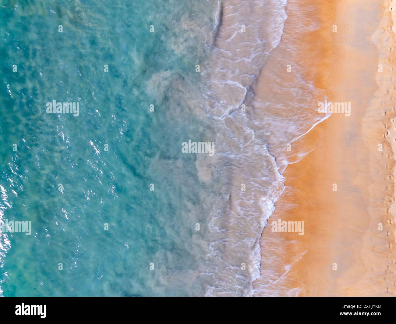 Aerial top view nature background of waves crashing in the ocean sea ...