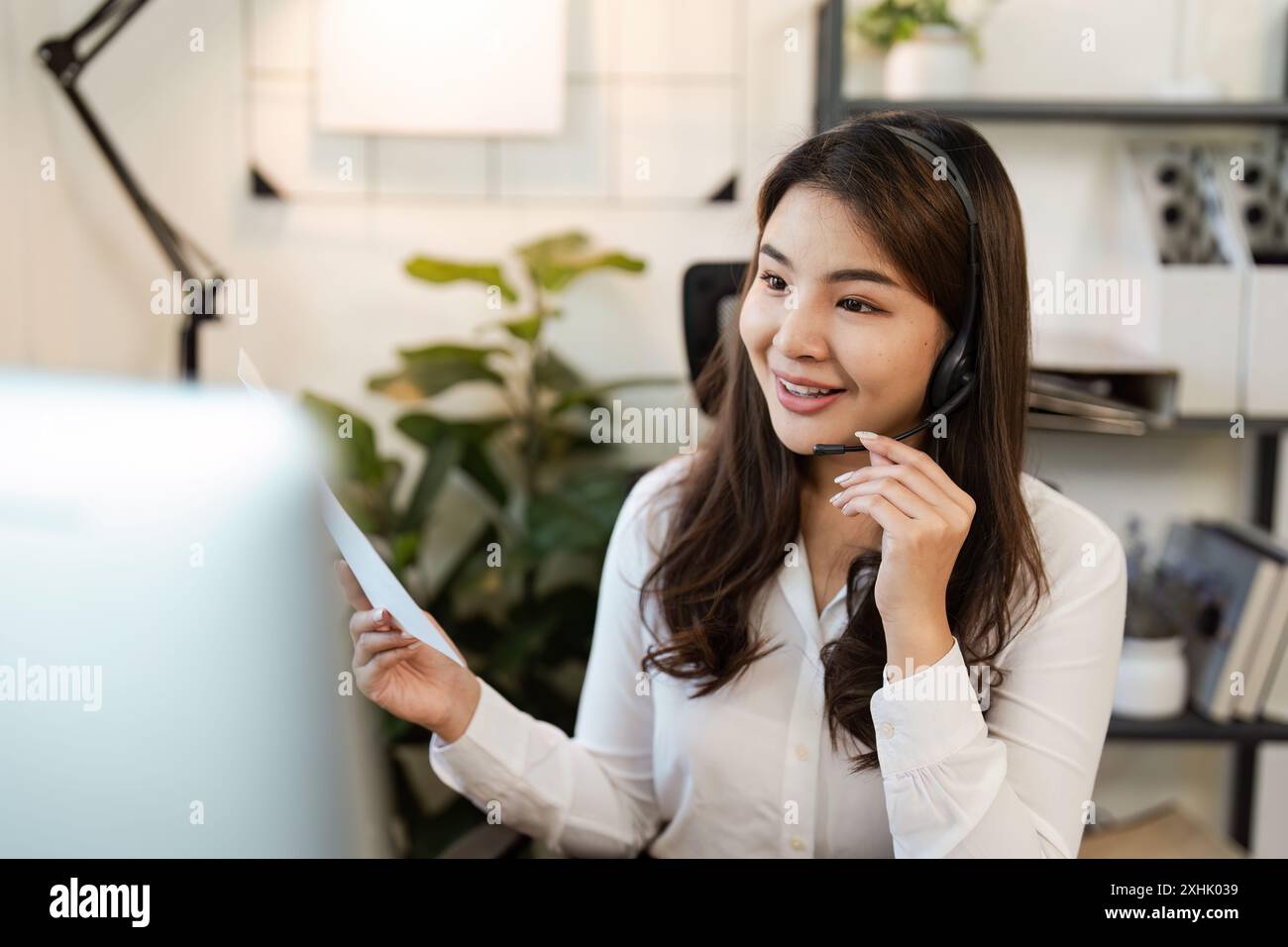 Professional Call Center Agent Providing Customer Support in a Modern ...