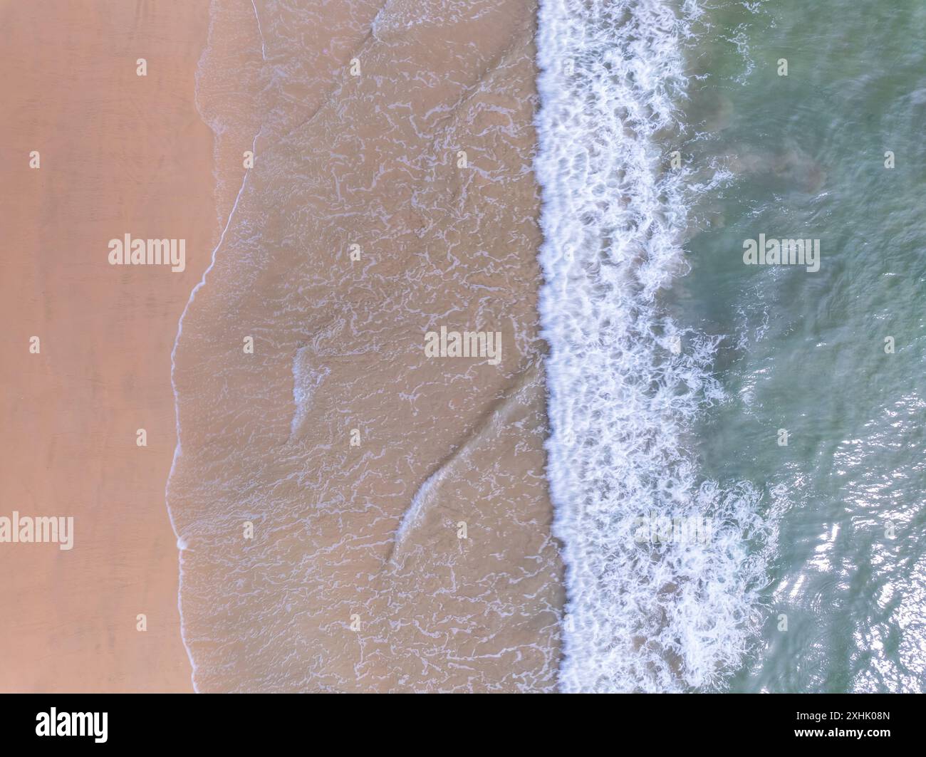 Aerial top view nature background of waves crashing in the ocean sea ...