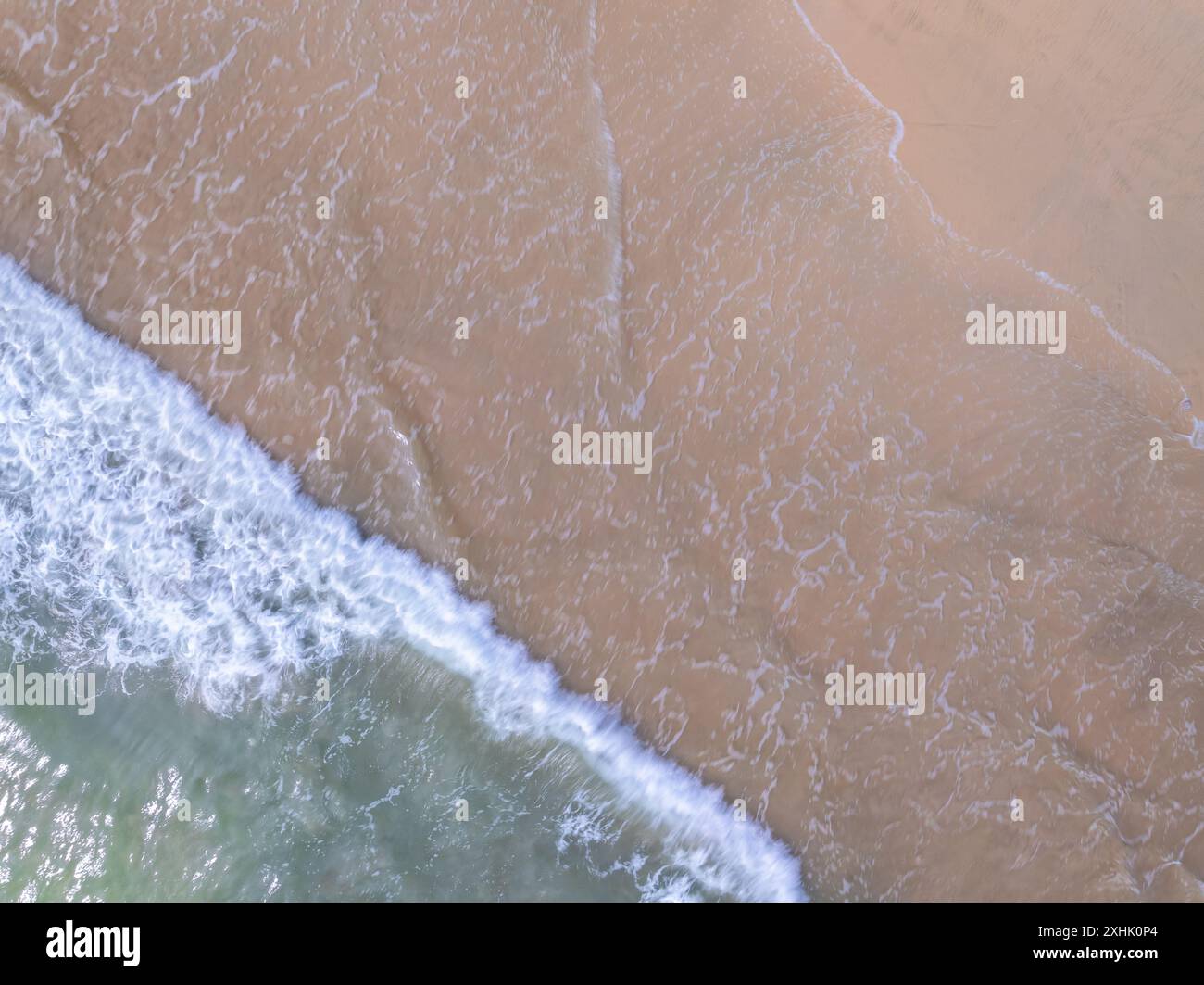 Aerial top view nature background of waves crashing in the ocean sea ...