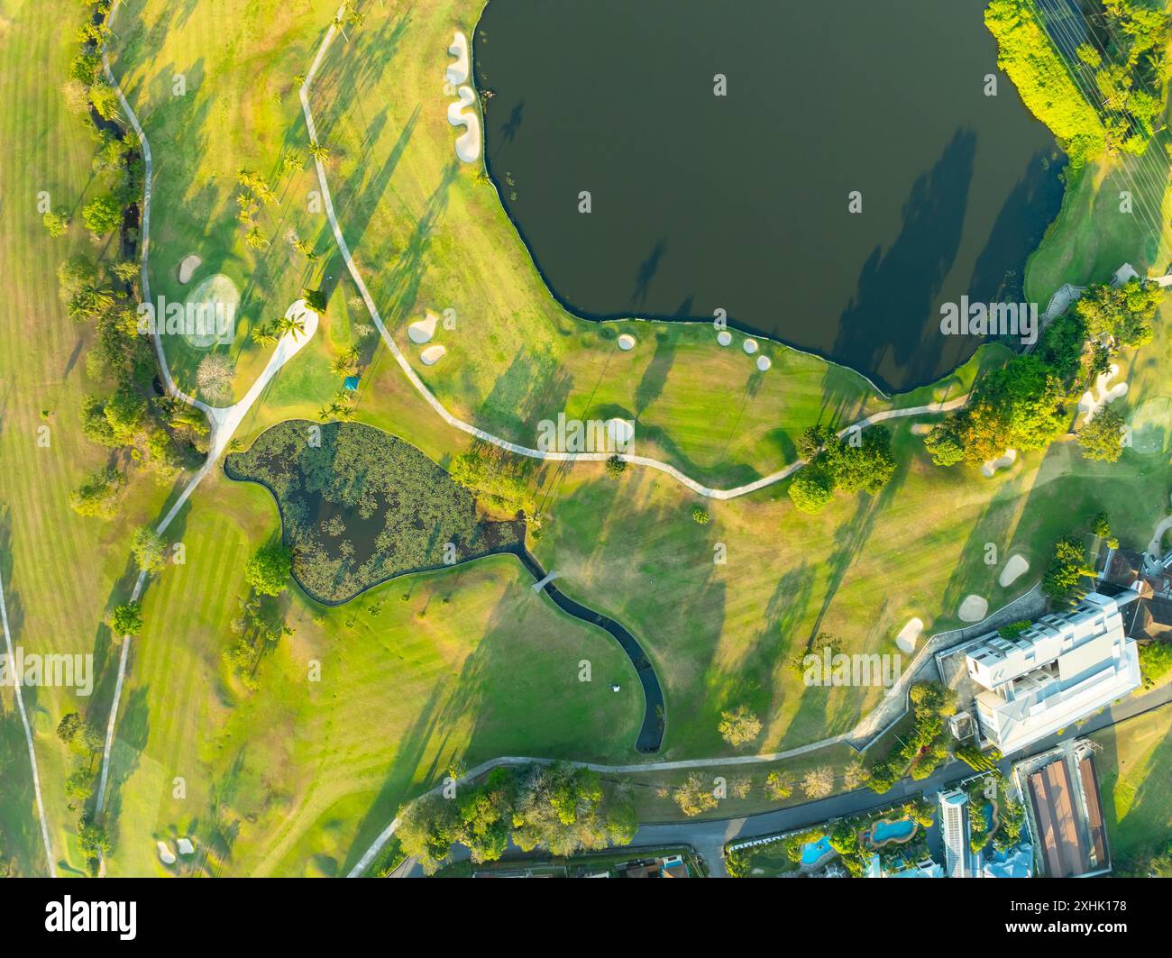 Aerial view drone shot of beautiful green golf field at Phuket island ...