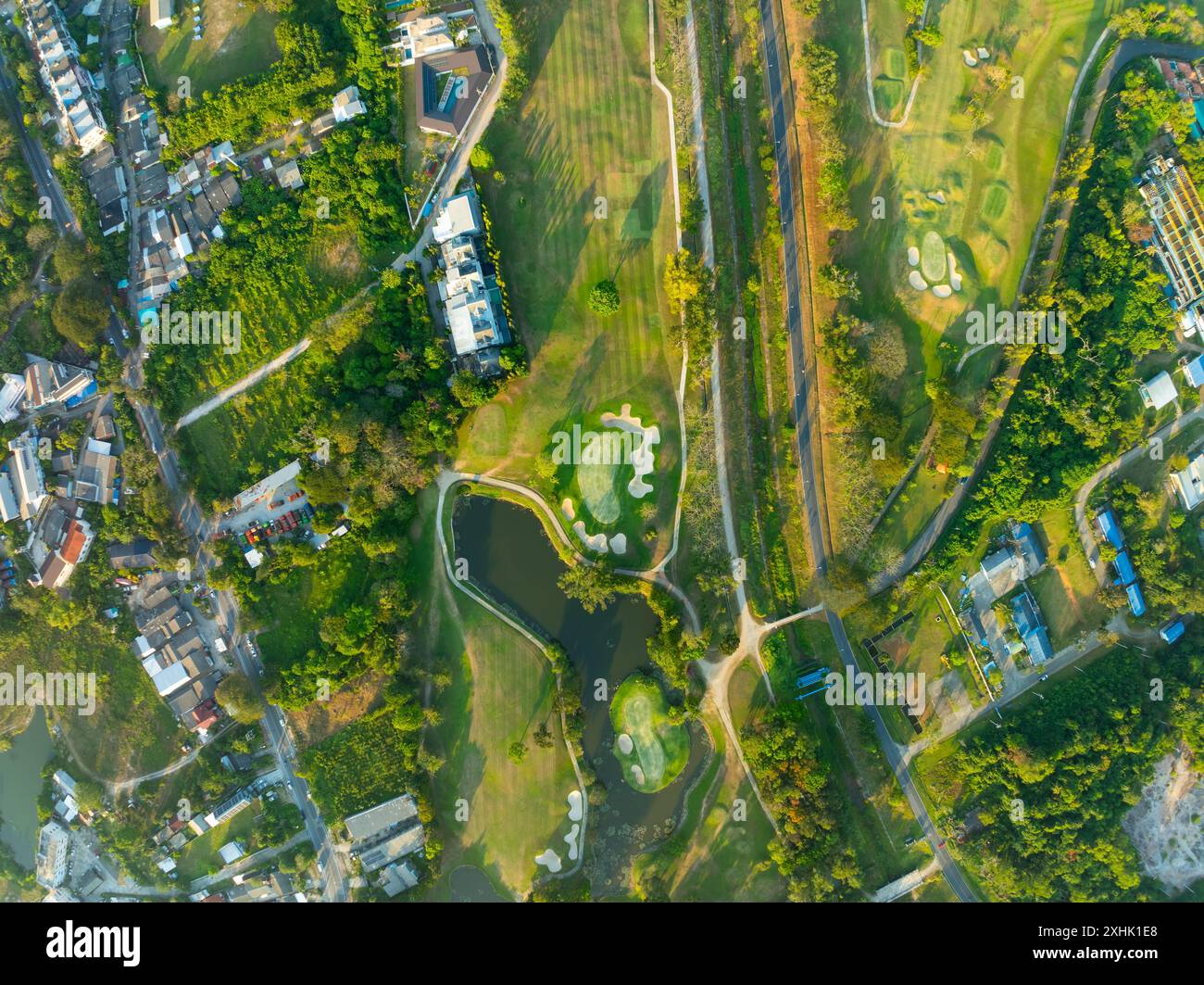 Aerial view drone shot of beautiful green golf field at Phuket island ...