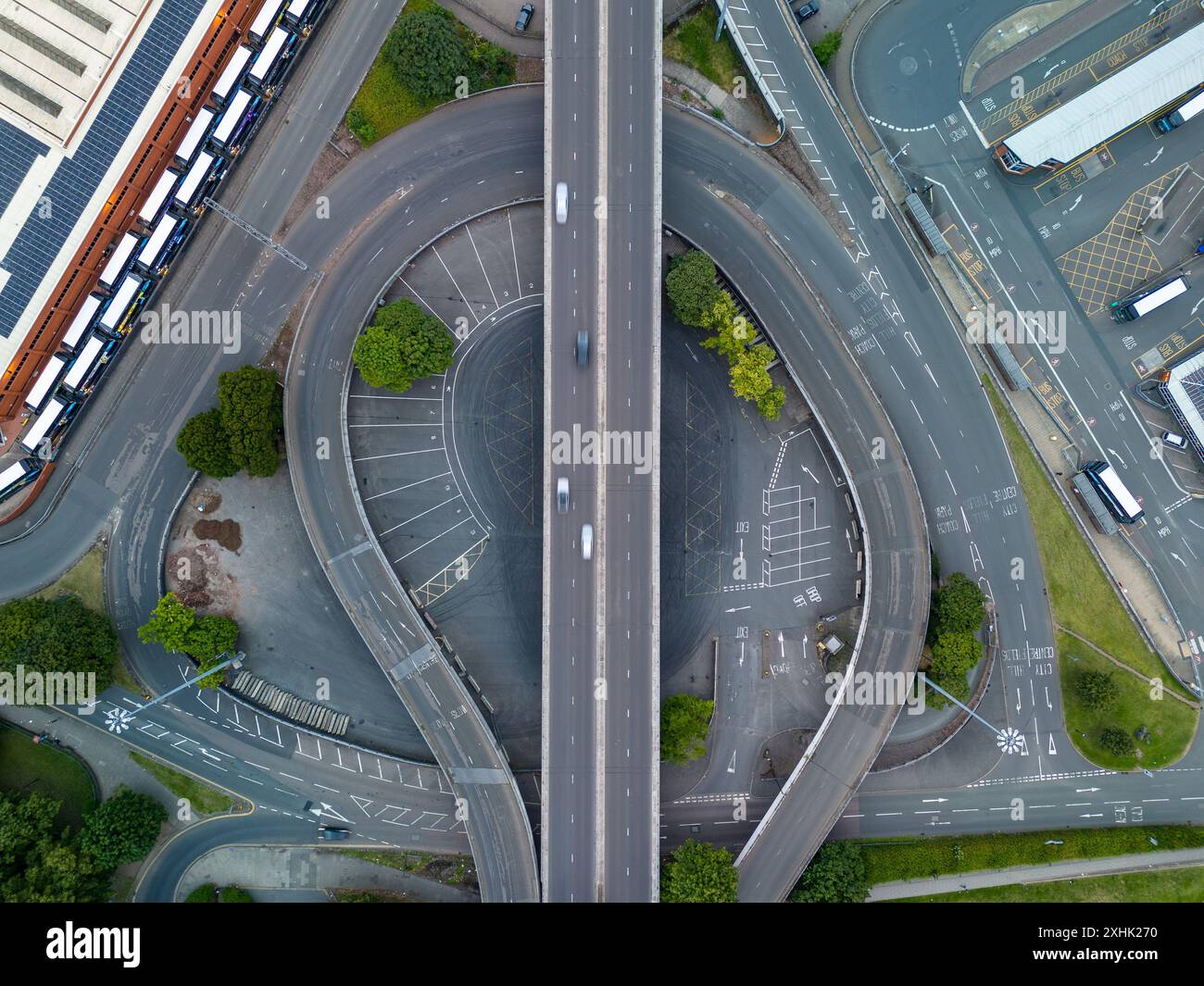 Aerial view of a complex road intersection with overpasses and ramps ...