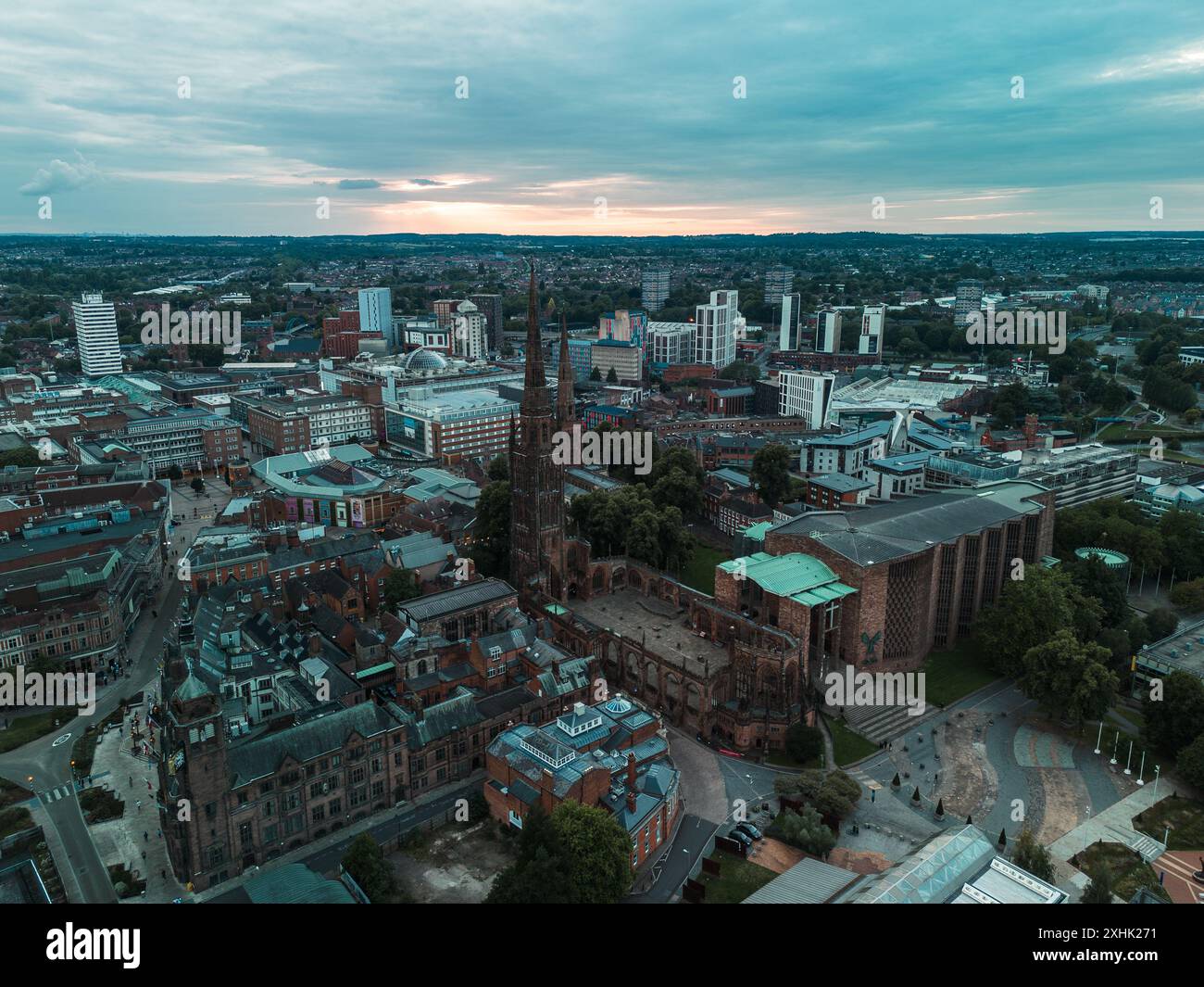 Aerial view of coventry city centre as the sun sets, showing a mixture ...