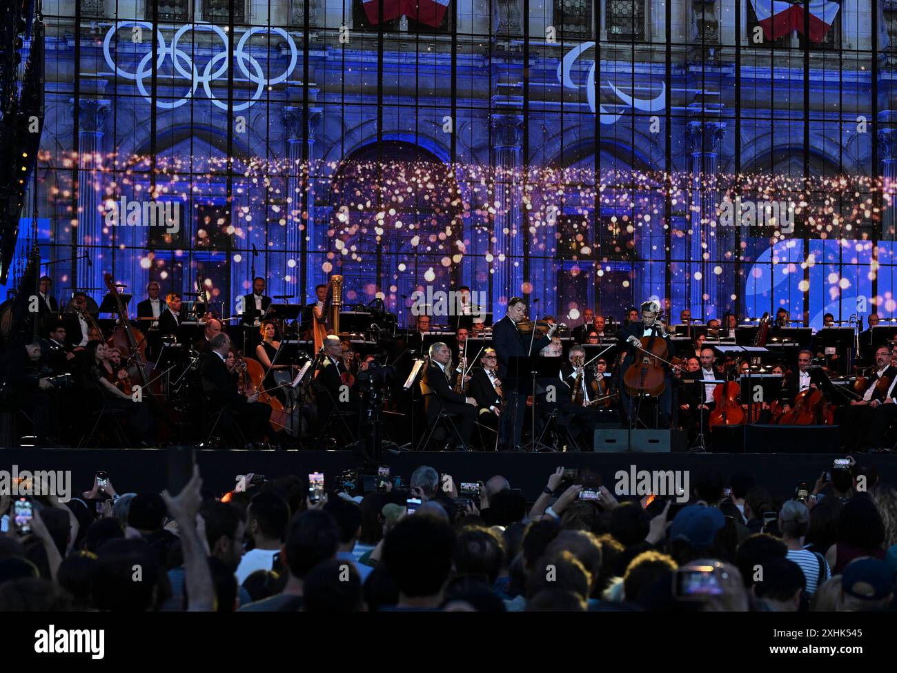 Paris, France. 14th July, 2024. Artists perform during the Olympic ...