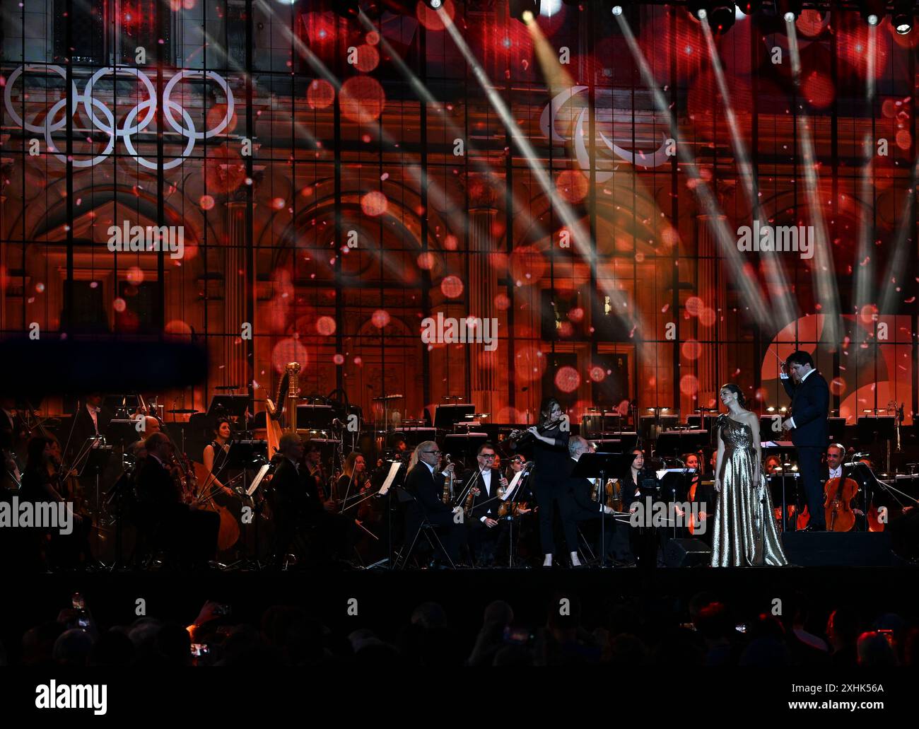 Paris, France. 14th July, 2024. Artists perform during the Olympic ...