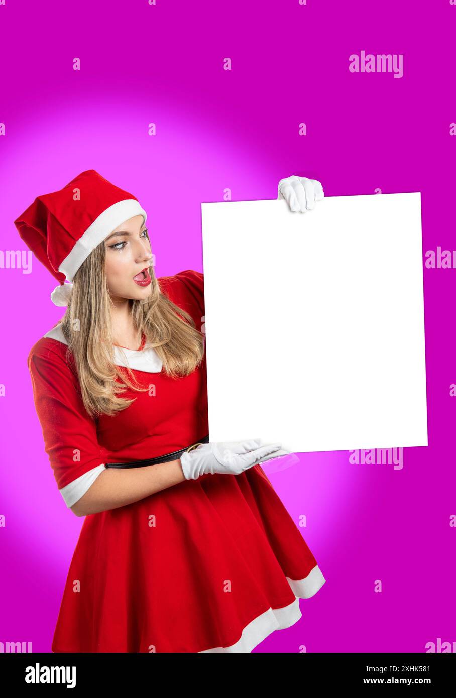 Beautiful blonde woman in santa hi-res stock photography and images - Alamy