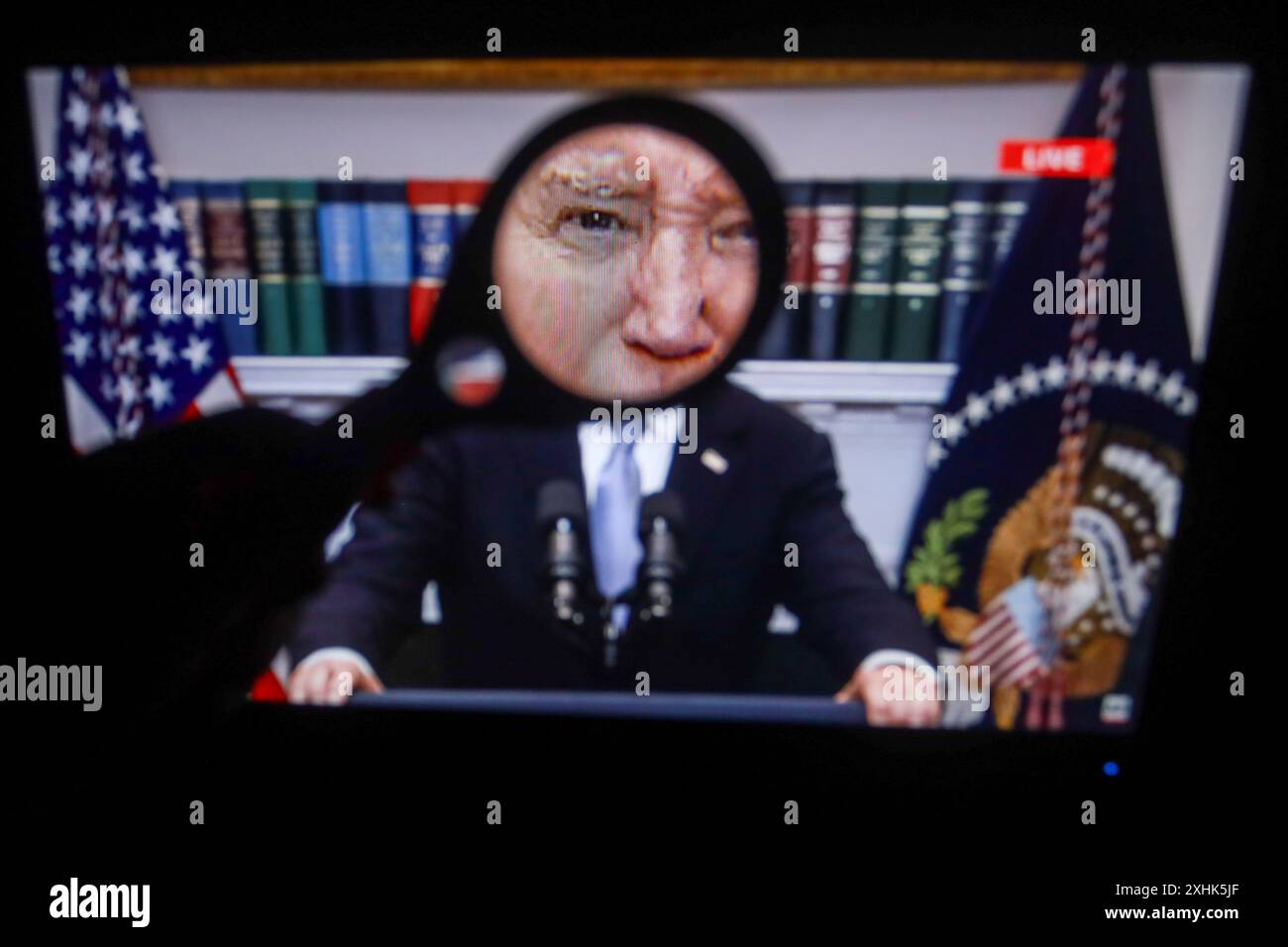 In this photo illustration, a screen shows current US President Joe ...