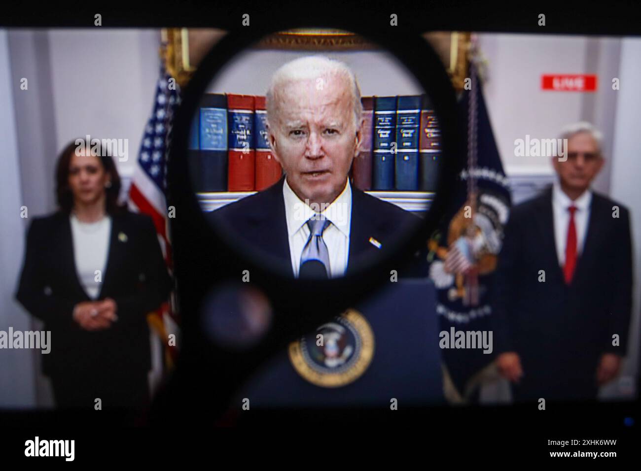In this photo illustration, a screen shows current US President Joe ...