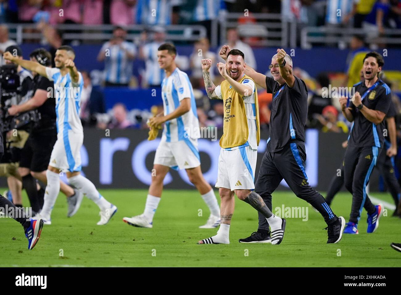Argentina's Lionel Messi, center, celebrates after his team defeated ...