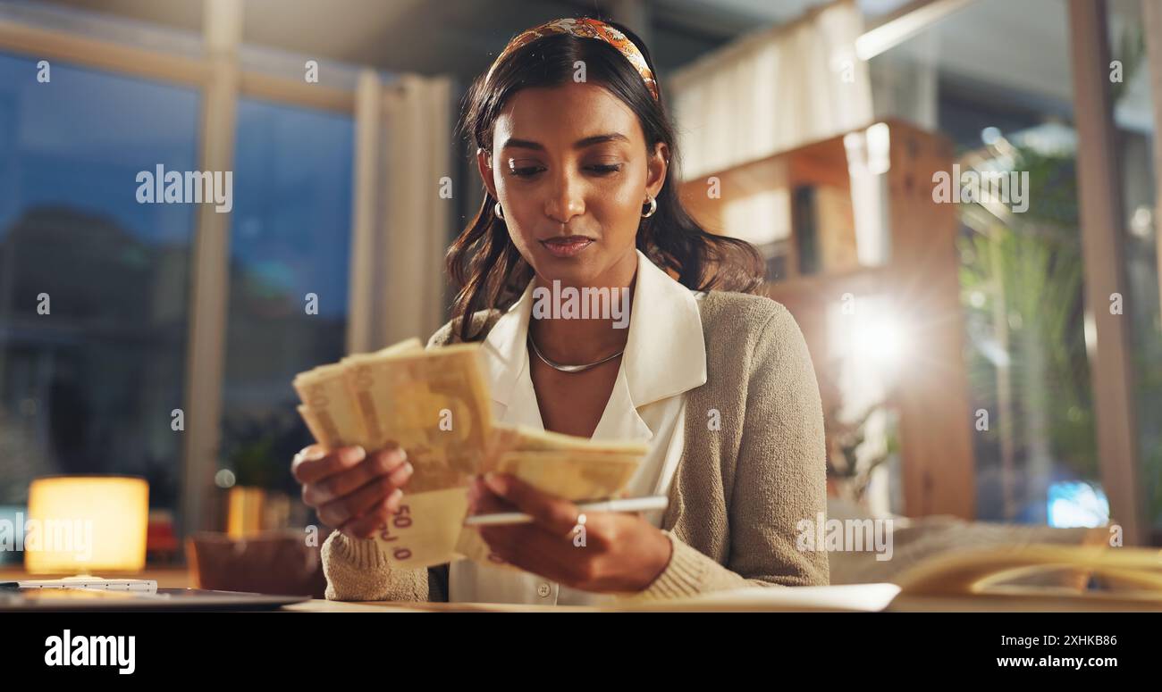 Woman, bank notes and counting cash in home for monthly budget ...