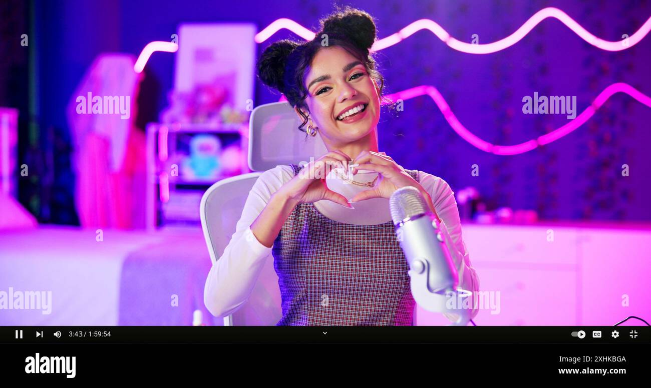 Streamer, portrait and woman with microphone, heart hands and neon ...