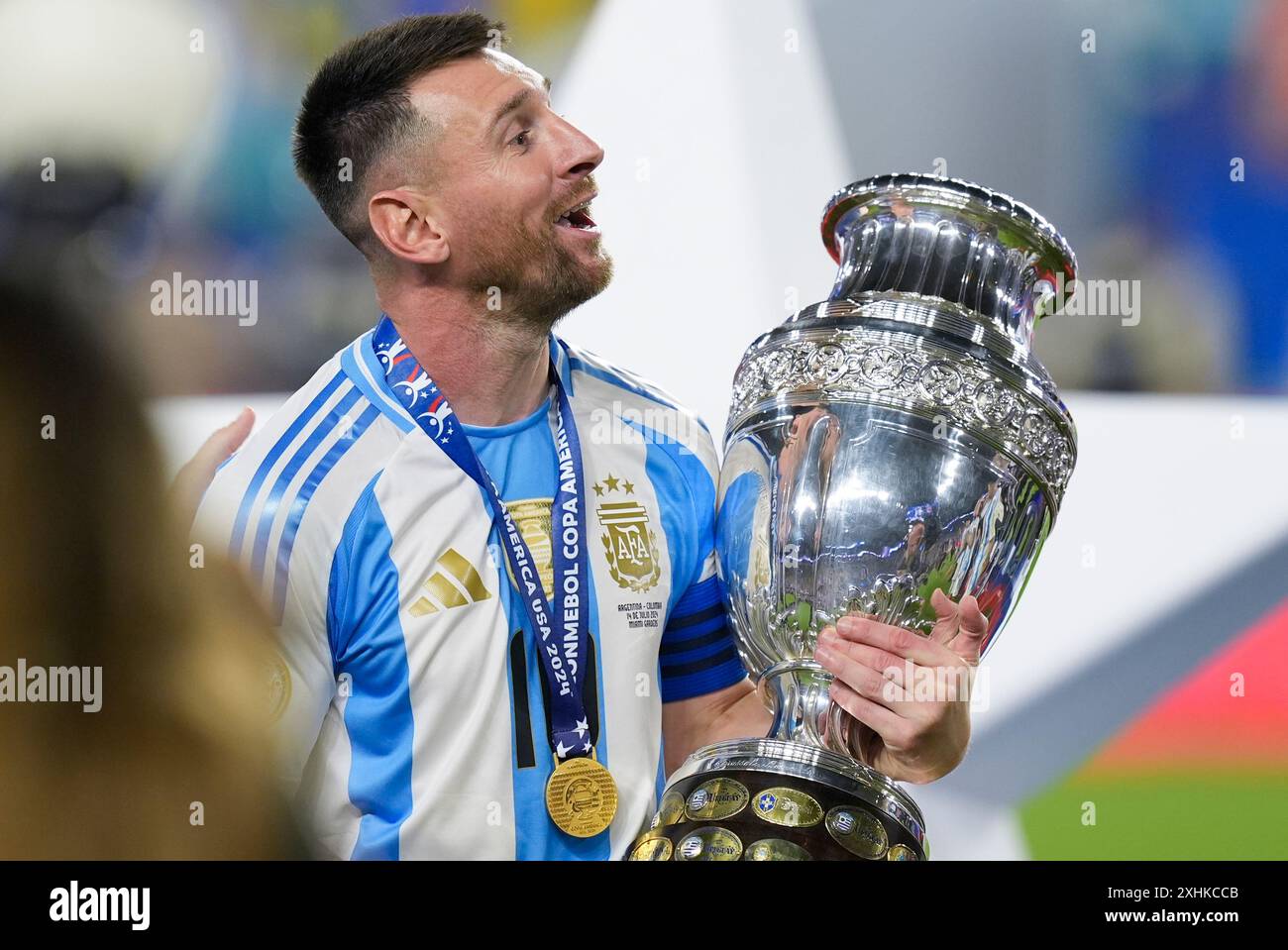 Argentina's Lionel Messi celebrates with the trophy after his team ...