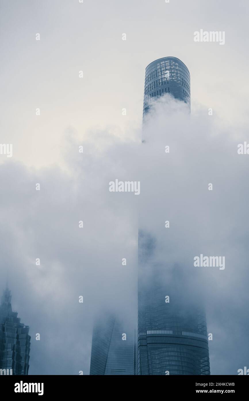 Tower over the fog Stock Photo - Alamy