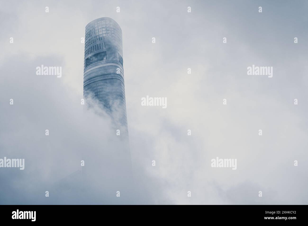 Tower over the fog Stock Photo - Alamy