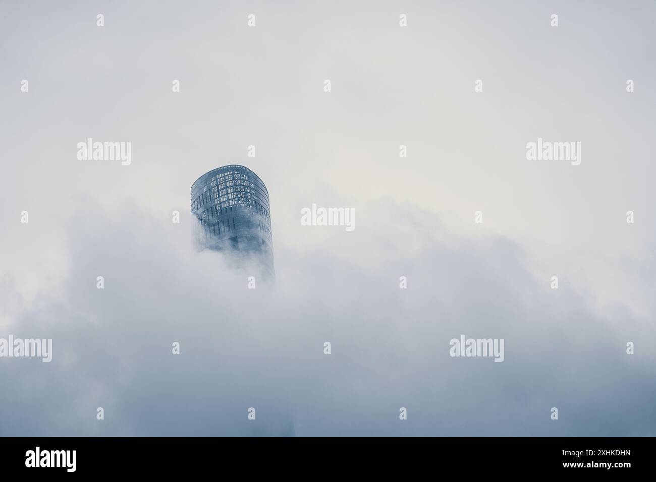 Tower over the fog Stock Photo - Alamy