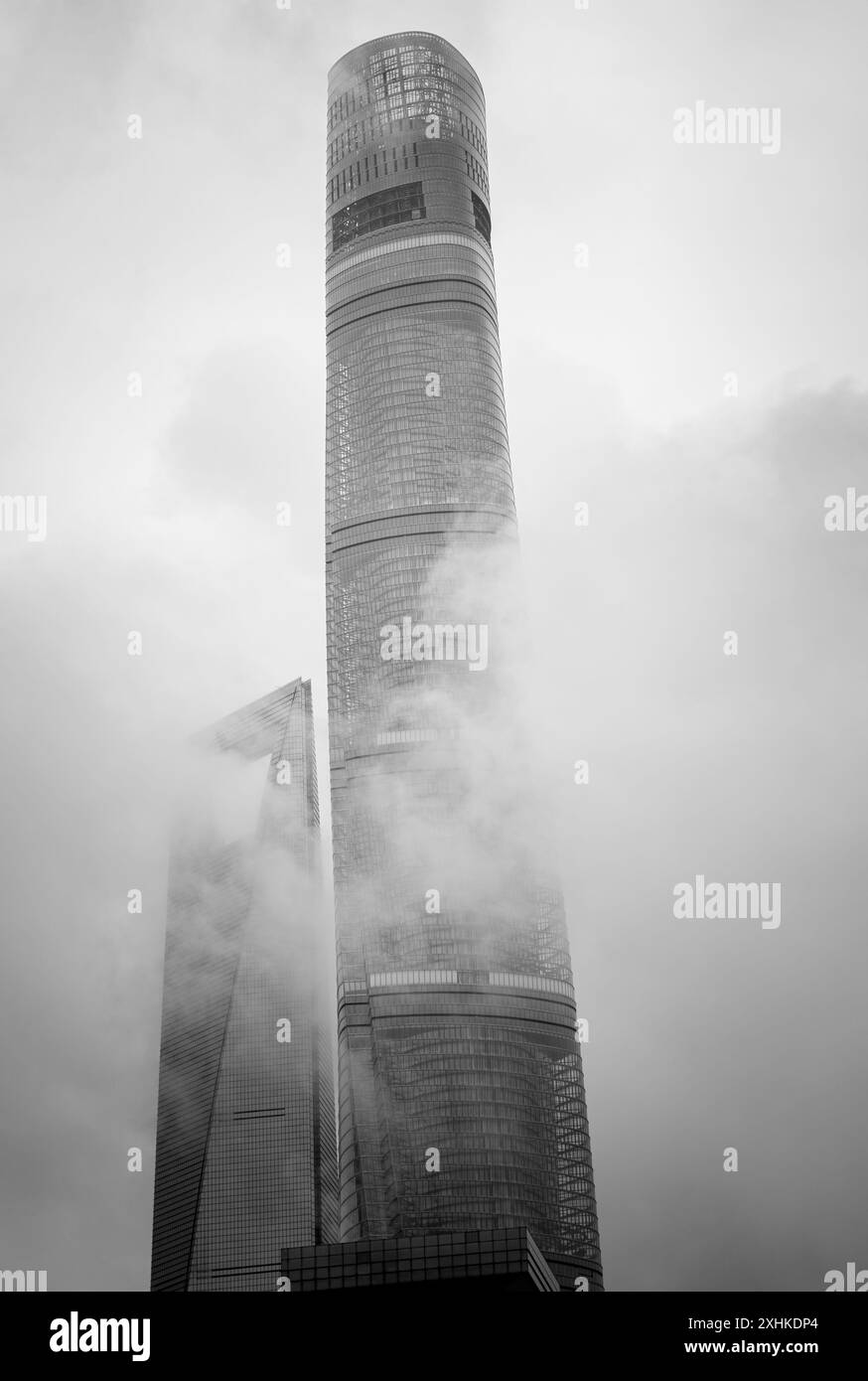 Tower over the fog Stock Photo - Alamy