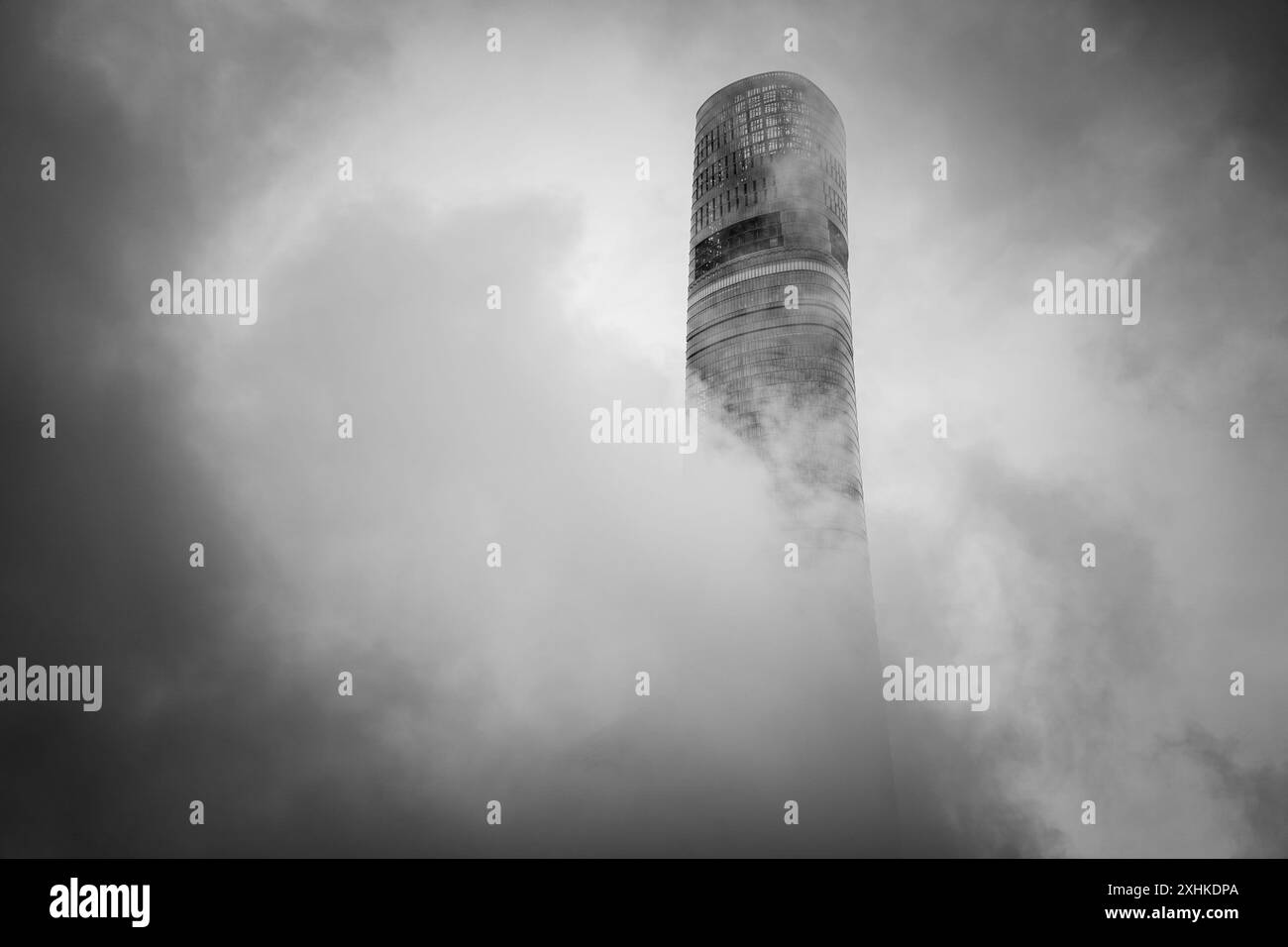Tower over the fog Stock Photo - Alamy