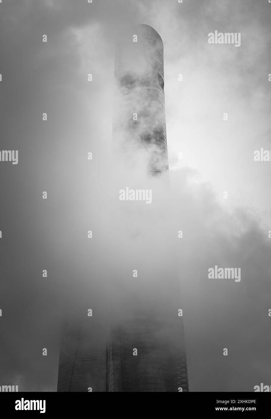 Tower over the fog Stock Photo - Alamy