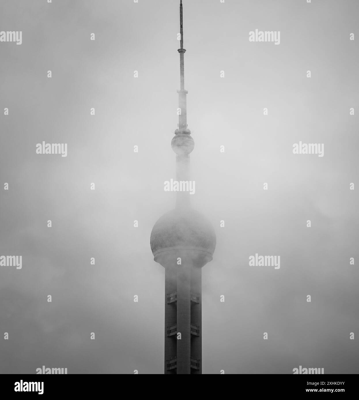 Tower over the fog Stock Photo - Alamy