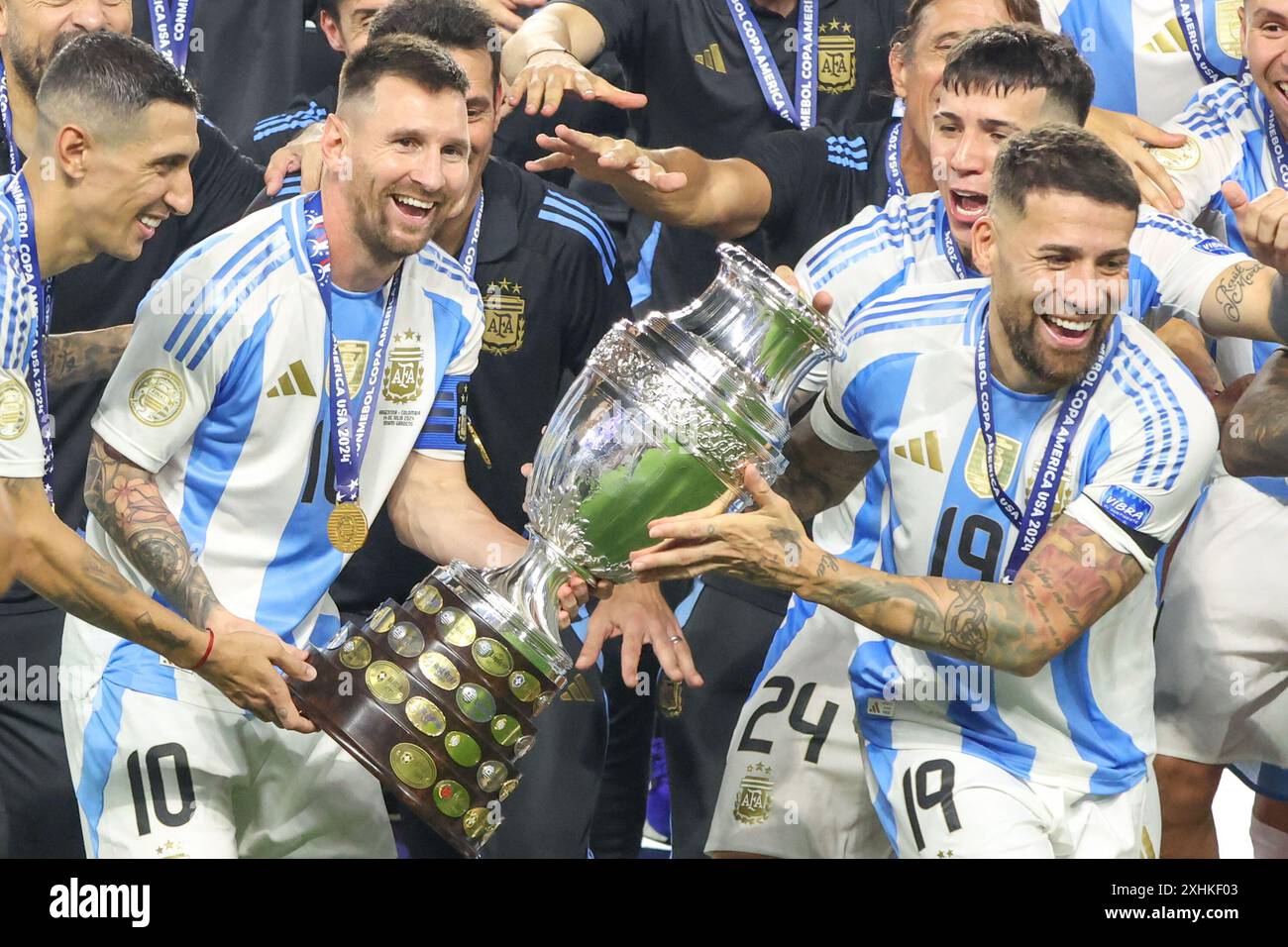 Miami, United States. 15th July, 2024. Lionel Messi lifts up the trophy ...