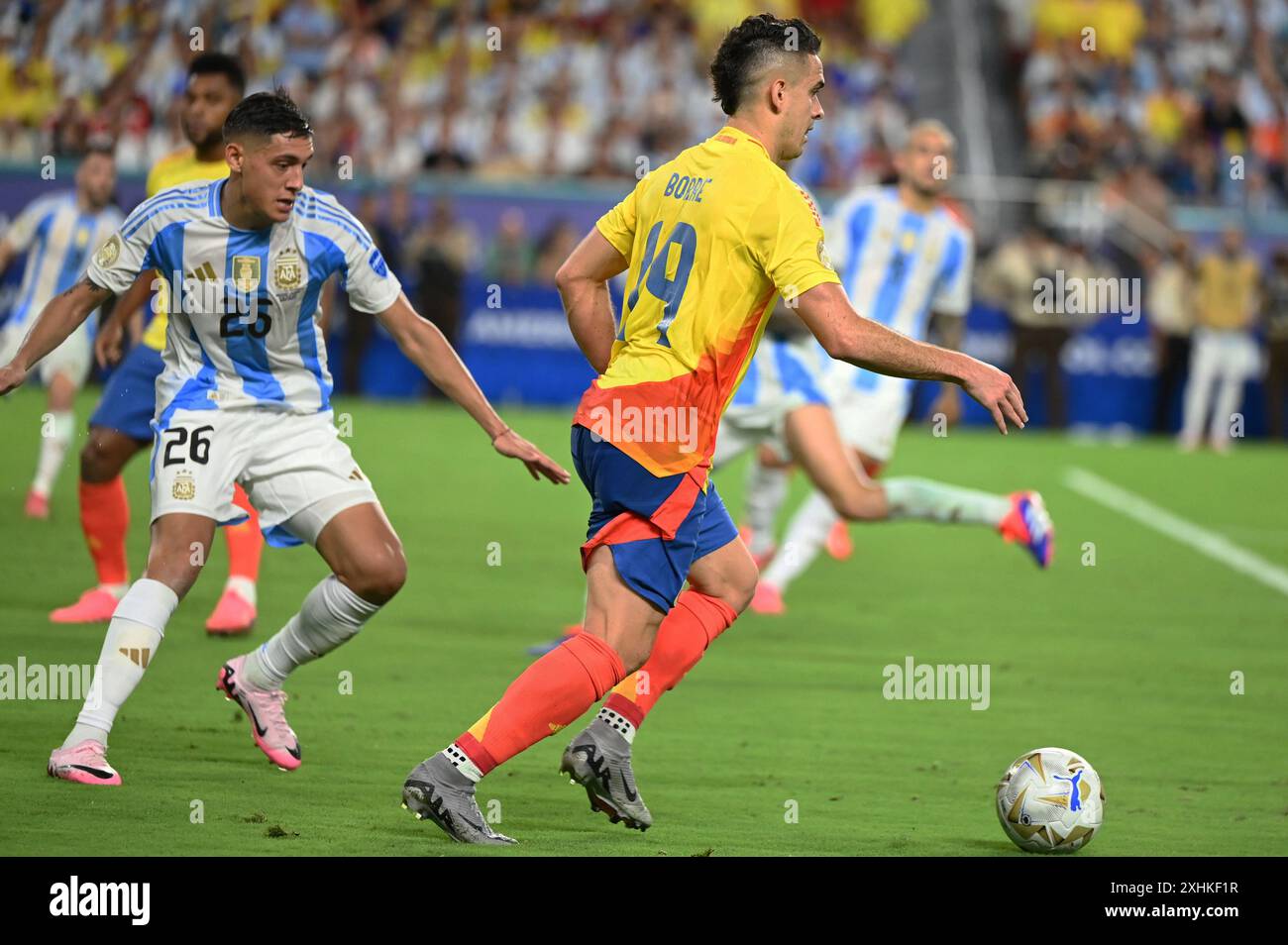 14th July 2024: Miami Gardens, Florida, USA: Nahuel Molina of Argentina challenges Rafael Borré ...