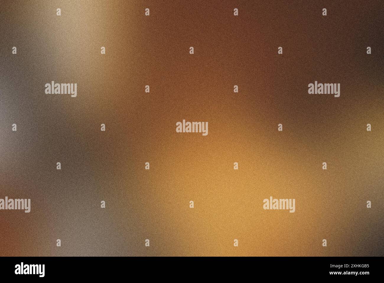 Abstract gold background with fine grain texture showing gradual ...