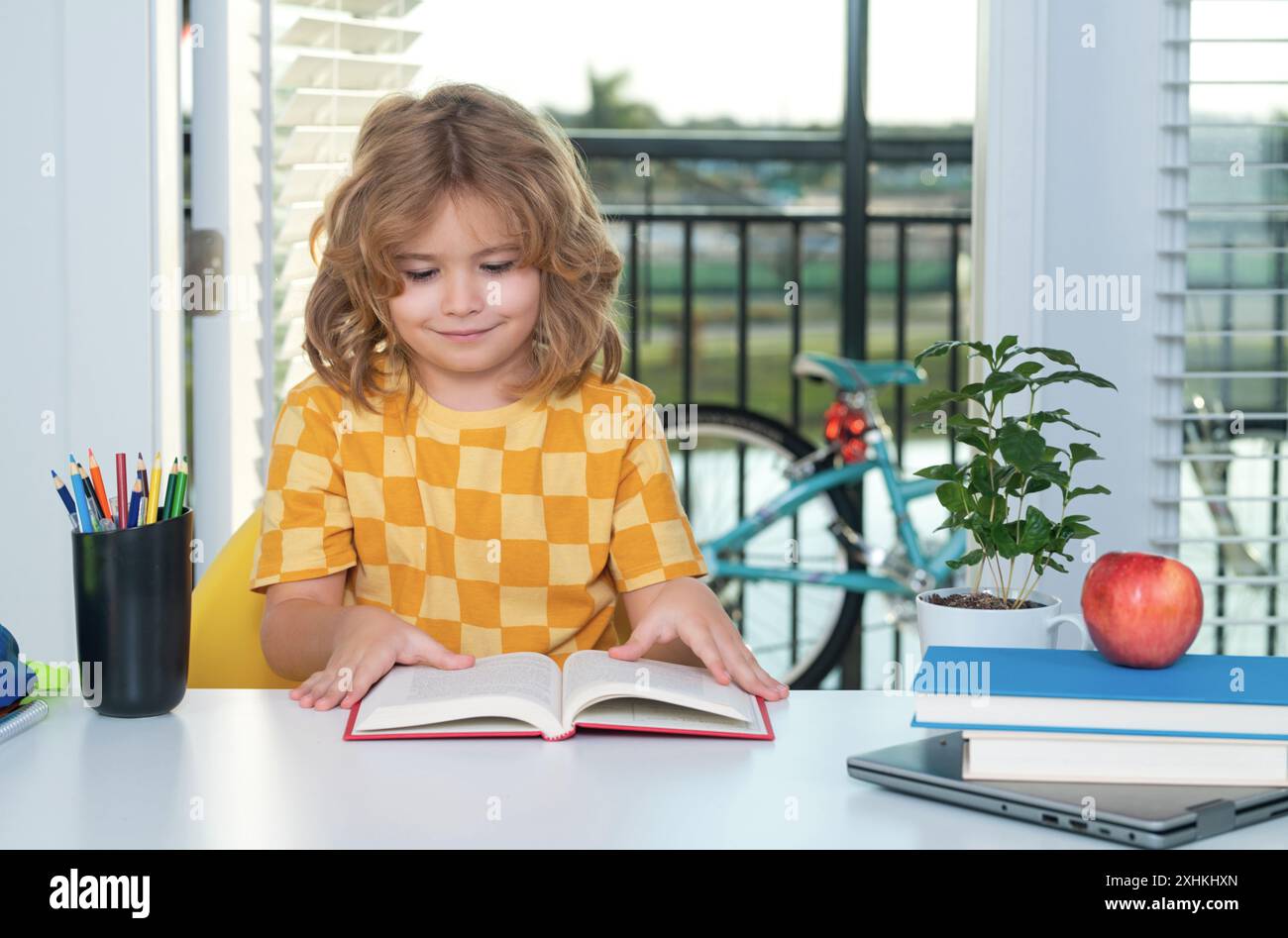 School child studying at home. Kid from elementary school. Child ...