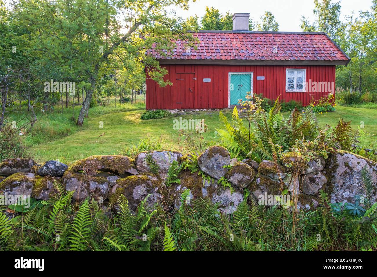 Idyllic red cottage stone hi-res stock photography and images - Alamy