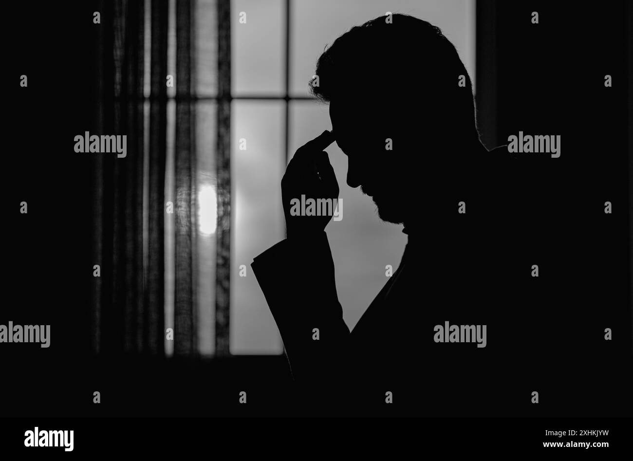 Man with sinus headache, tension or cluster headache, close up portrait ...