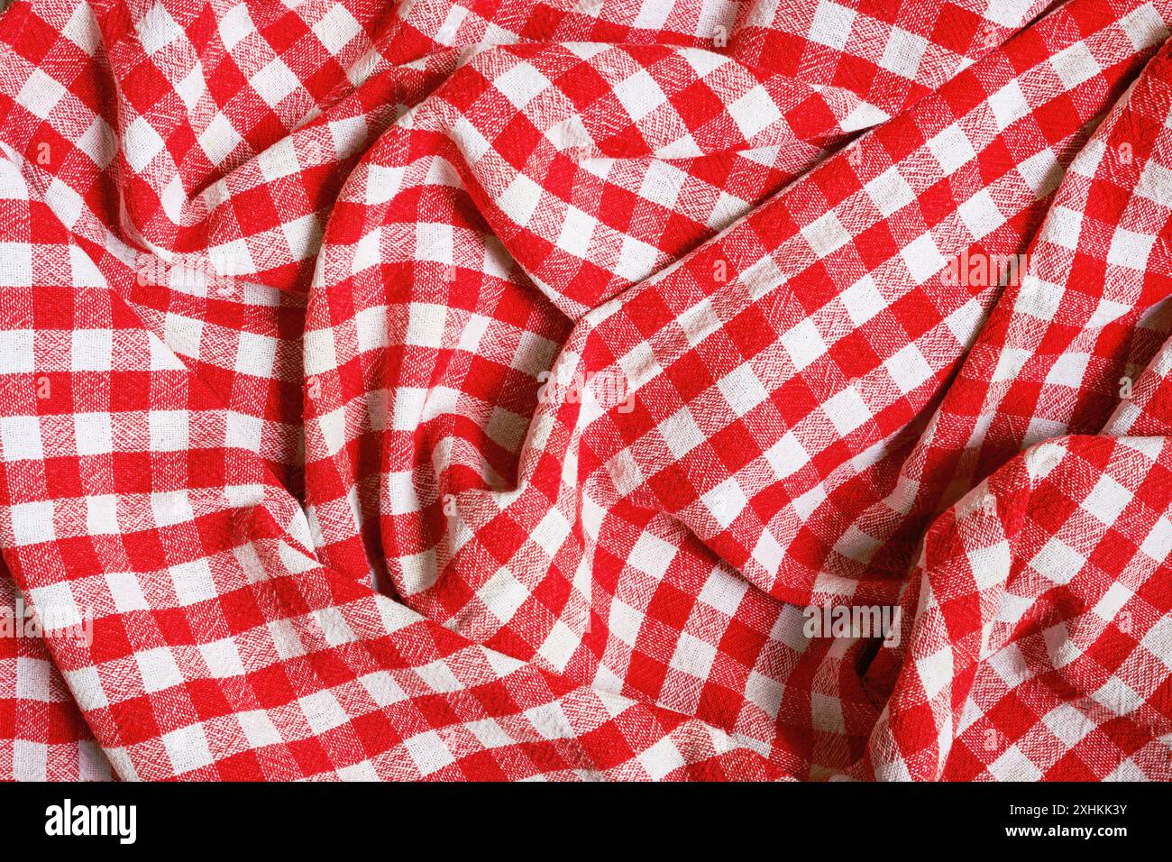 Red and white checkered plaid table cloth as background Stock Photo - Alamy