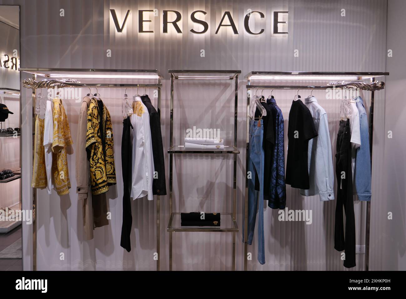 VERSACE CLOTHING ON DISPLAY INSIDE THE FASHION BOUTIQUE Stock Photo - Alamy