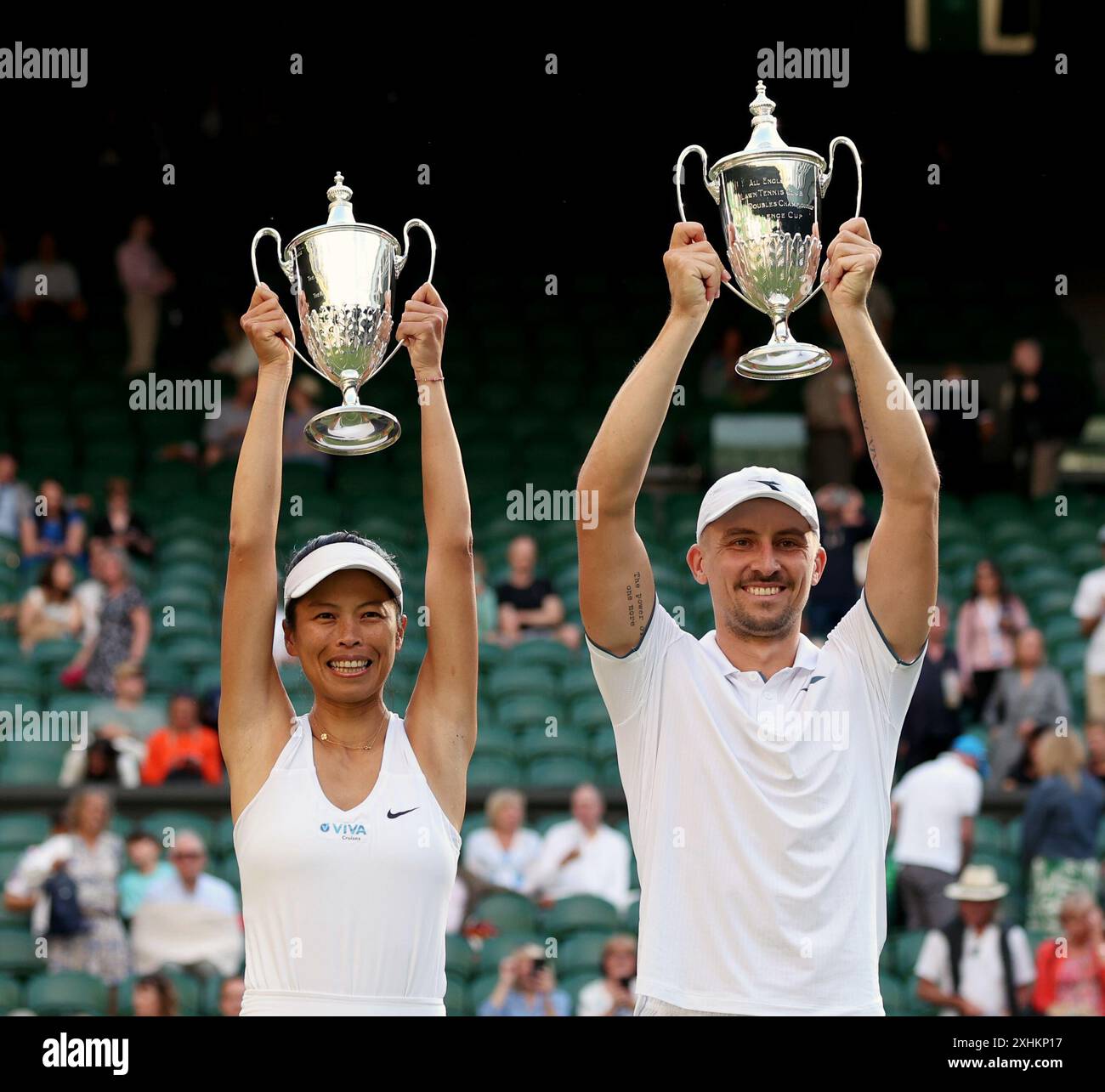 London, Britain. 14th July, 2024. Jan Zielinski (R)/Hsieh Su-Wei lift ...