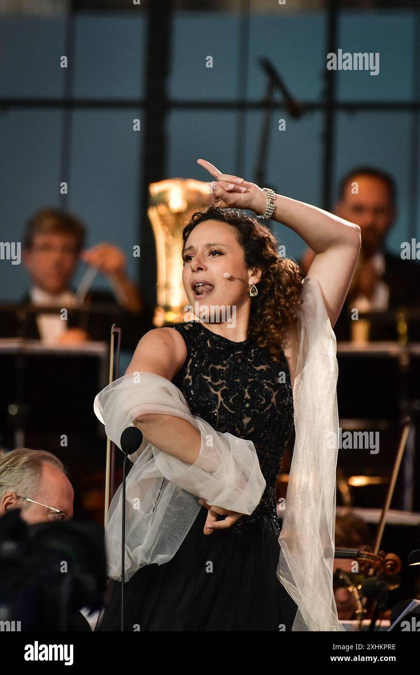 French Opera singer Adele Charvet performs before the arrival of during ...