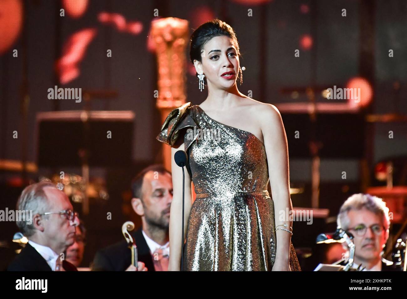 Egyptian Soprano Fatima Said performs before the arrival of the Olympic ...