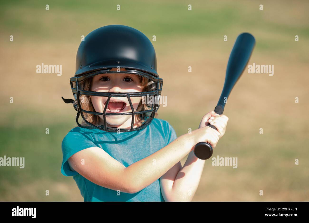 Little boy posing with a baseball bat. Portrait of kid playing baseball ...