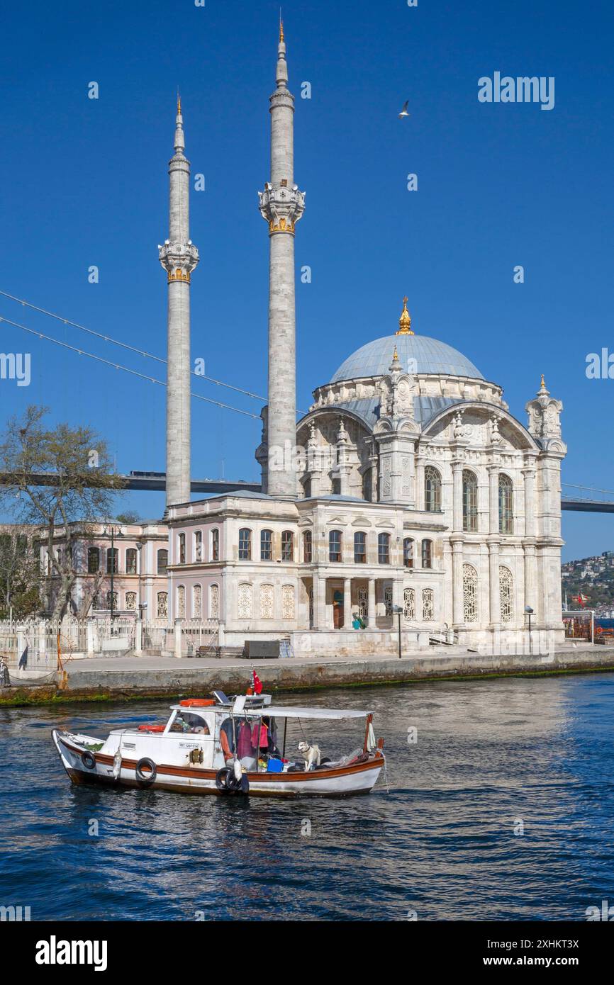 Turkey, Istanbul, Ortakoy, old fishing boat in front of the Ortakoy ...