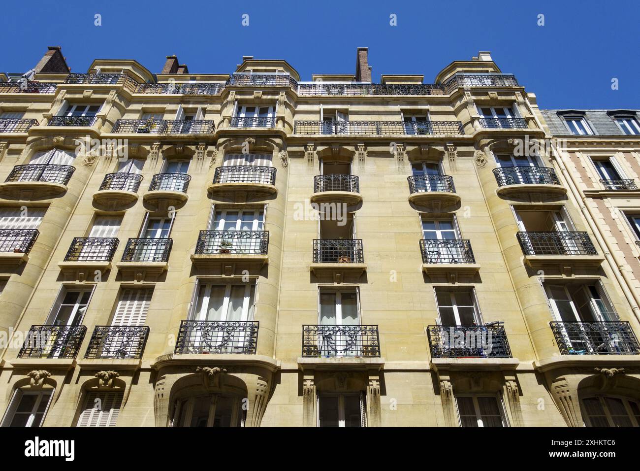 France, Paris, Haussmannian building facade of the 18th arrondissement ...