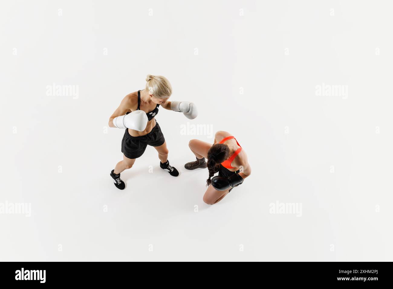 Dynamic boxing scene with two determined female competitors, women in ...