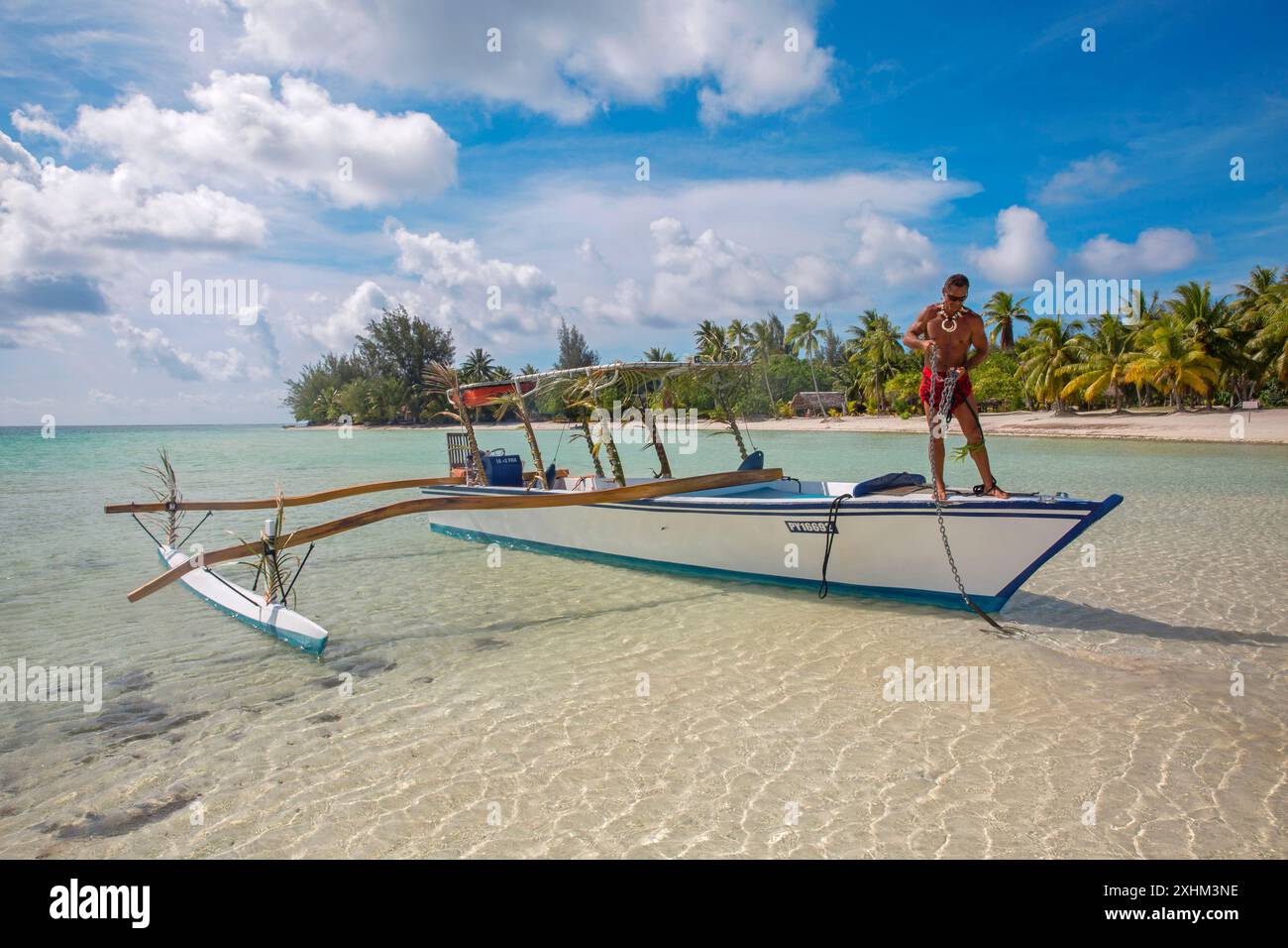 French Polynesia, Bora Bora island, Rosto, Polynesian guide in his va'a ...