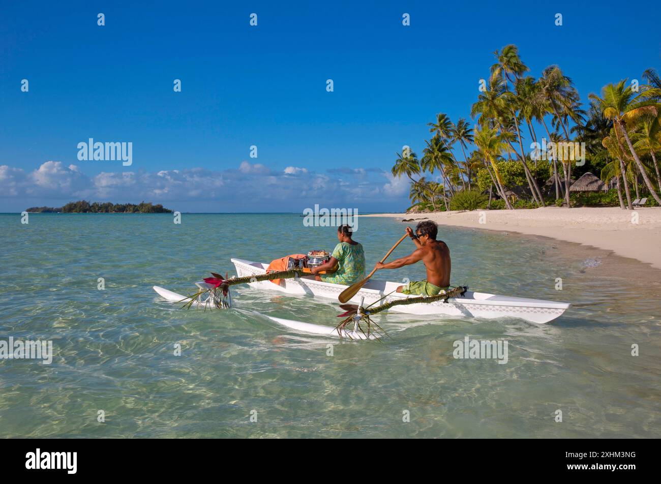 French Polynesia, Bora Bora island, Polynesian couple working at the ...