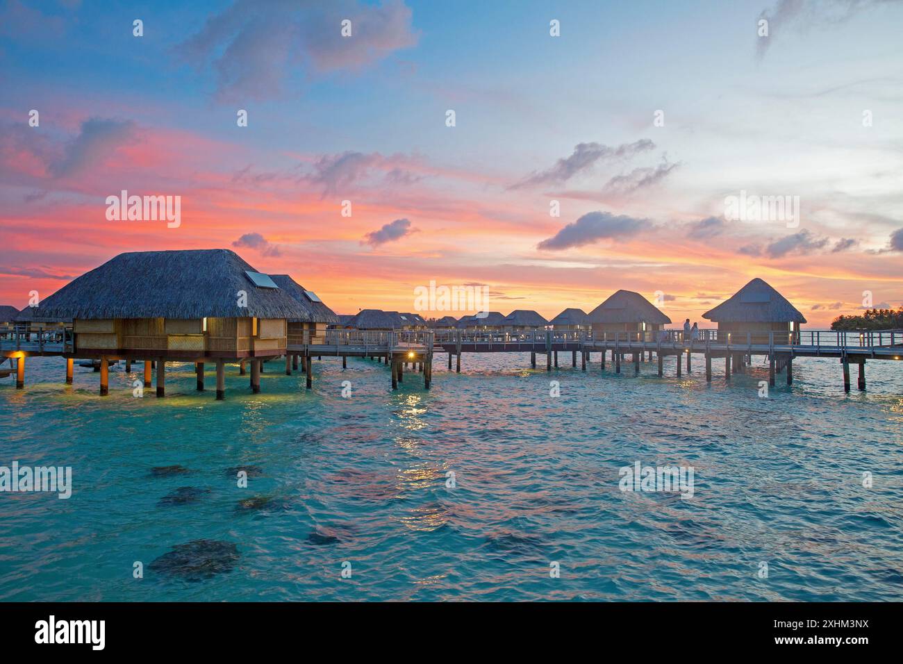 French Polynesia, Bora Bora island, overwater bungalows floating on the lagoon of the Bora Bora ...