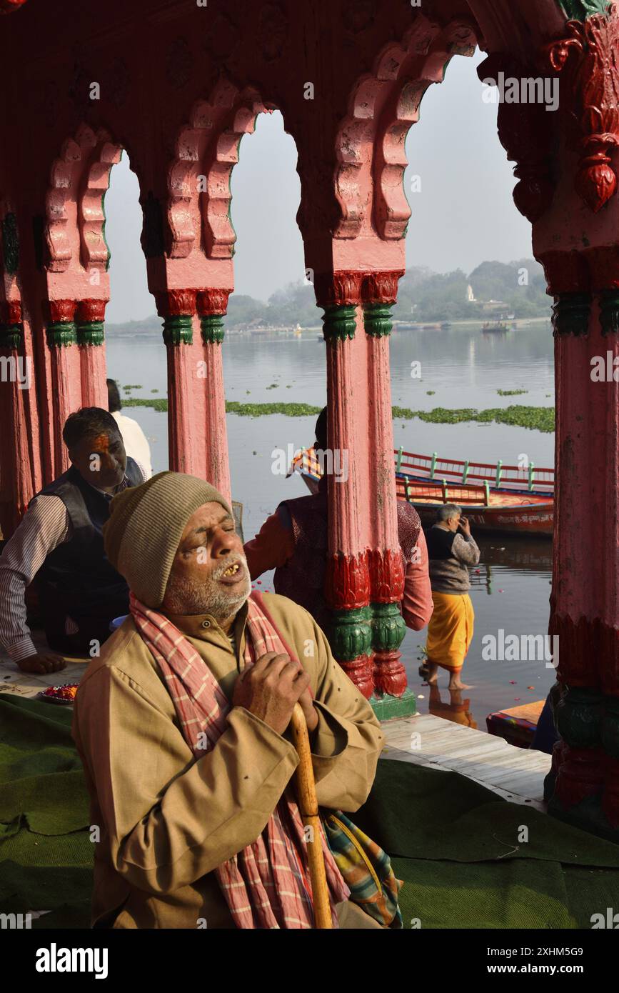 India, Uttar Pradesh, Mathura, Early morning Puja (prayer) on the banks ...